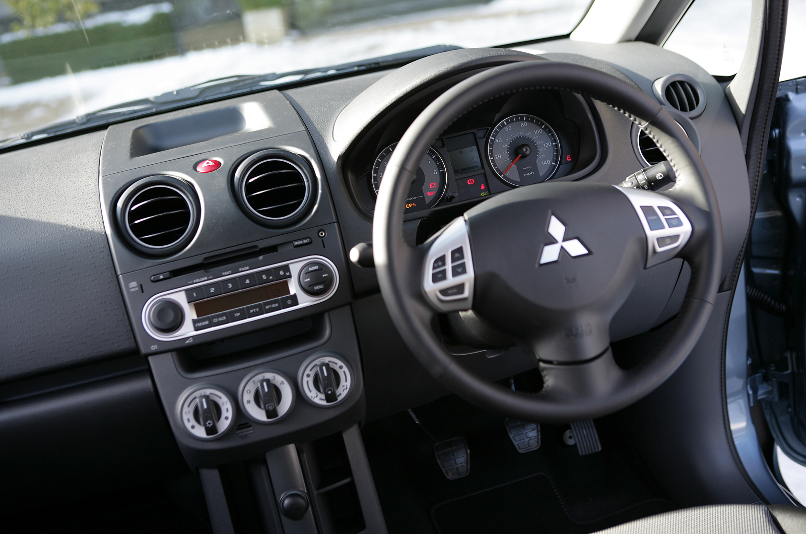 Mitsubishi Colt 2004-2013 interior | Autocar