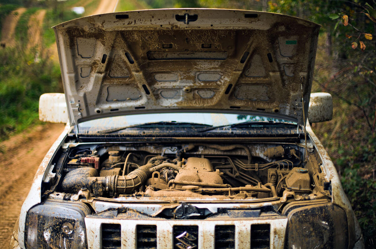 Suzuki Jimny vs Range Rover: £15k and £100k off-roaders do battle | Autocar