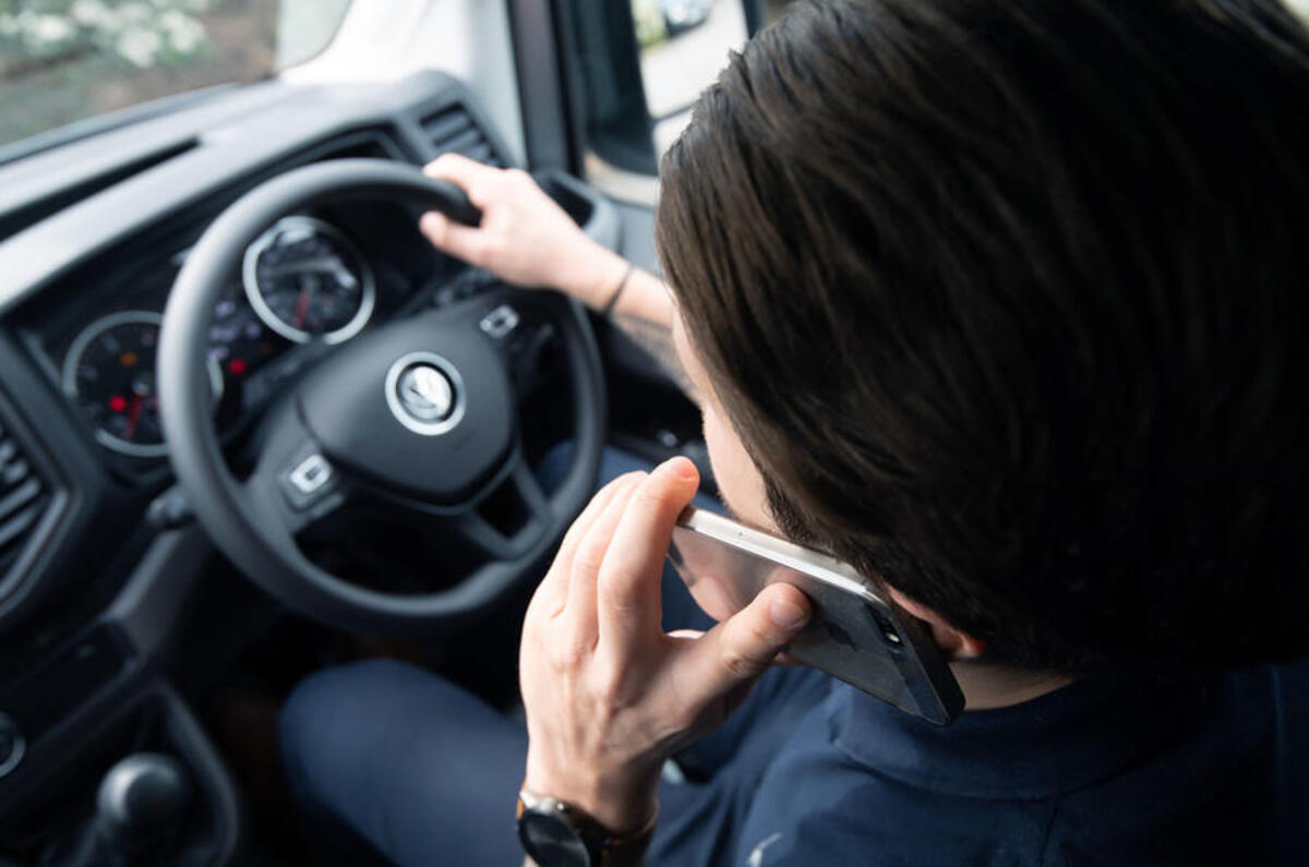 UK government moves to tighten mobile phone driving laws | Autocar