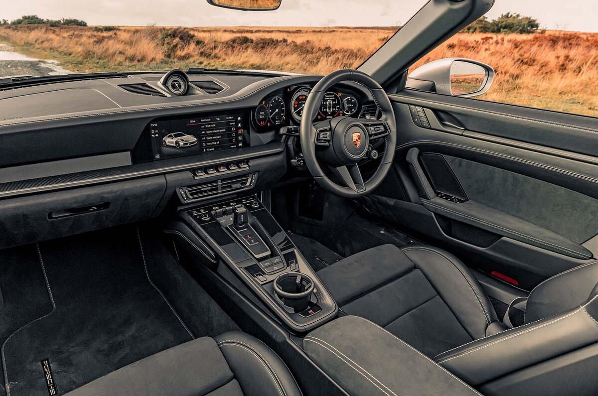 GT showdown: Mercedes-AMG SL 55 vs Porsche 911 GTS | Autocar