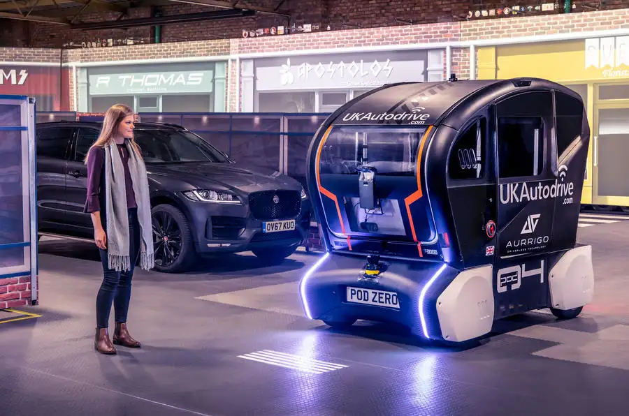 Jaguar Land Rover self-driving vehicle projects images on road ahead ...