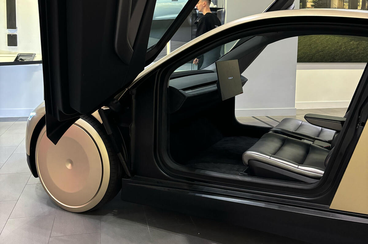 Tesla self-driving Robotaxi shown in UK ahead of 2027 launch | Autocar